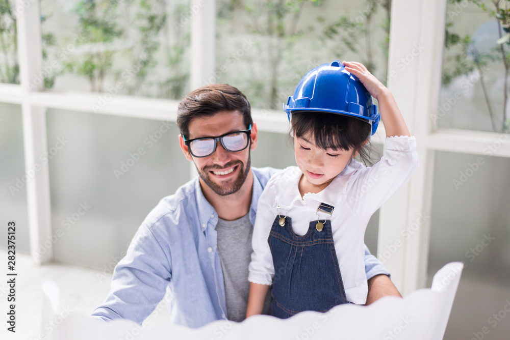 Architect father and his child girl working together at home,Laughing ...