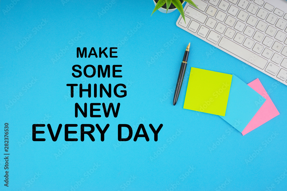 Flat lay, top view office table desk. Workspace with MAKE SOMETHING NEW ...