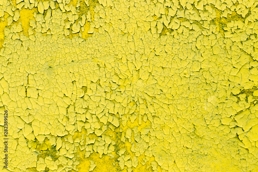 rough background for designers. The texture of the old cracked yellow ...