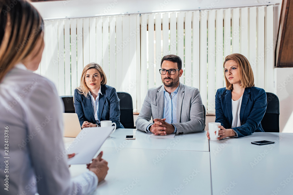 Human resources - job interview concept. Hr team considering can Stock ...