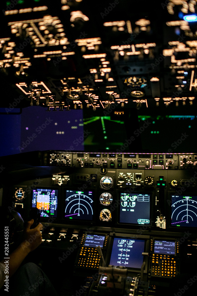 Aircraft interior, cockpit view inside the airliner. Point of view from ...