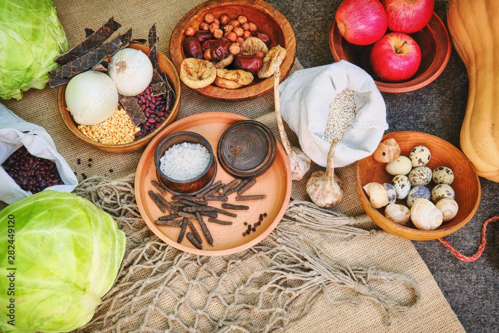 Food residents of ancient Rome on the table, reconstruction. Salt ...