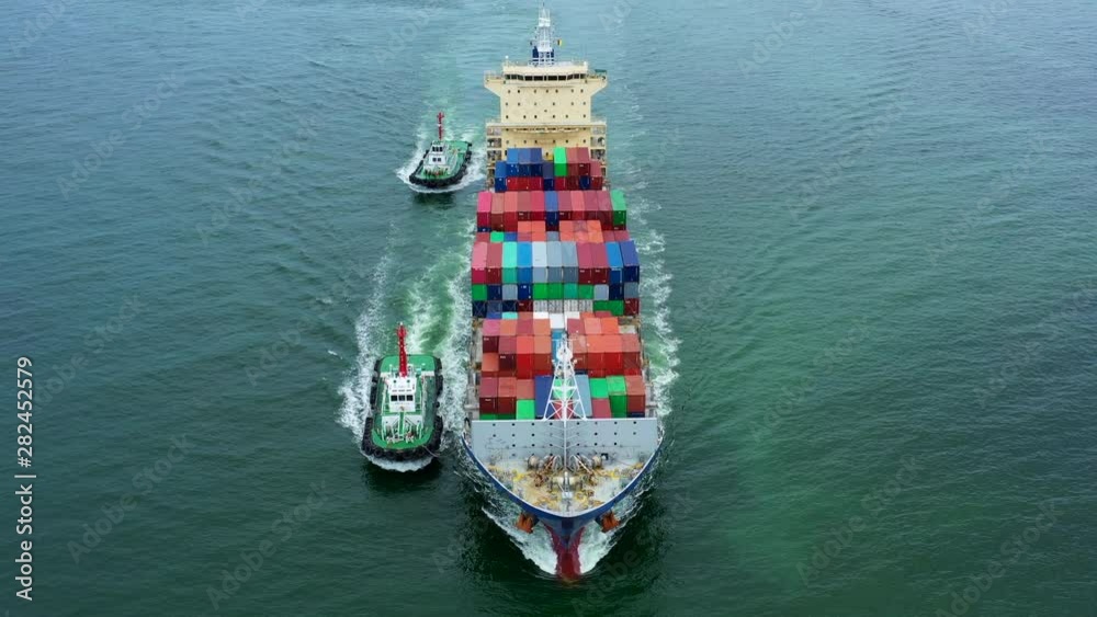 4k, Aerial view container ship carrying container in import export ...