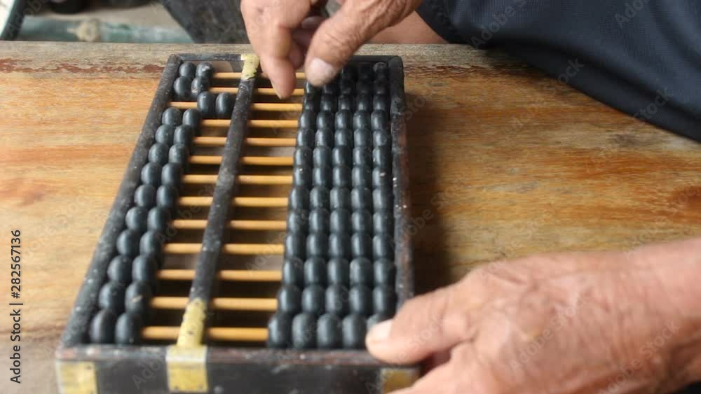 Video „chinese abacus is a calculating tool used primarily in parts of ...