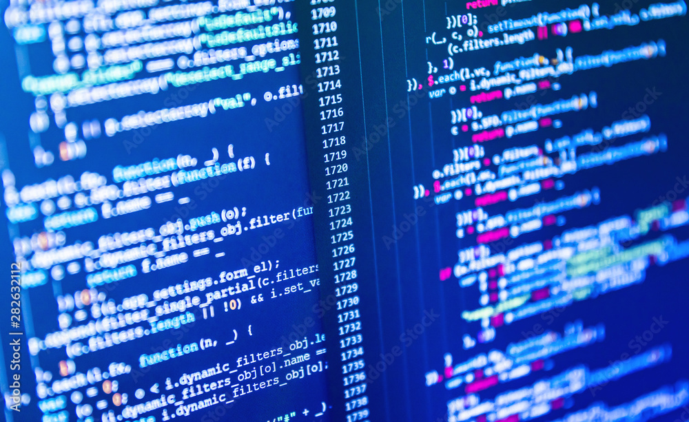 Computer language script code screen. Programmer working in a software ...