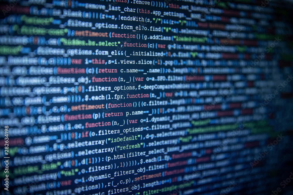 Writing programming code on laptop. Software developer programming code ...