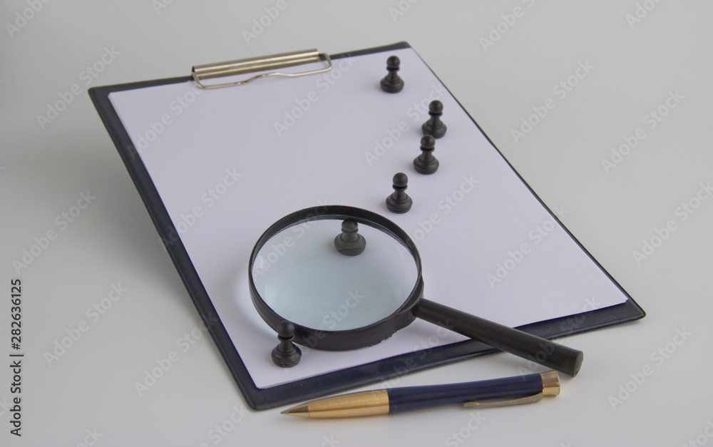 shapes and a magnifying glass. the concept management human resources ...
