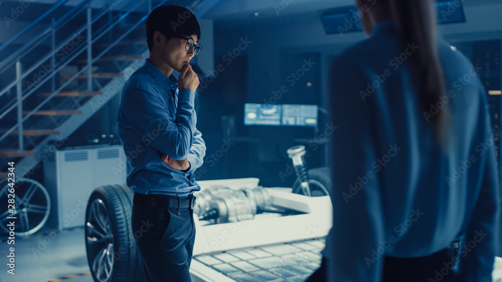 Automotive Design Engineers Working on Electric Car Chassis Prototype ...