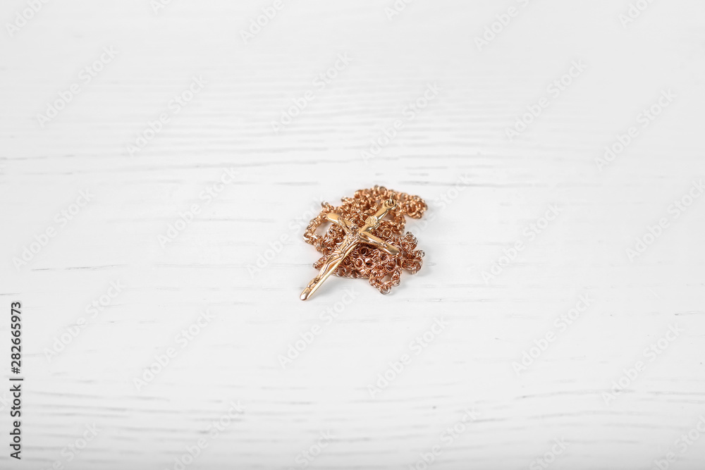 Gold cross and chain on white background Stock Photo | Adobe Stock