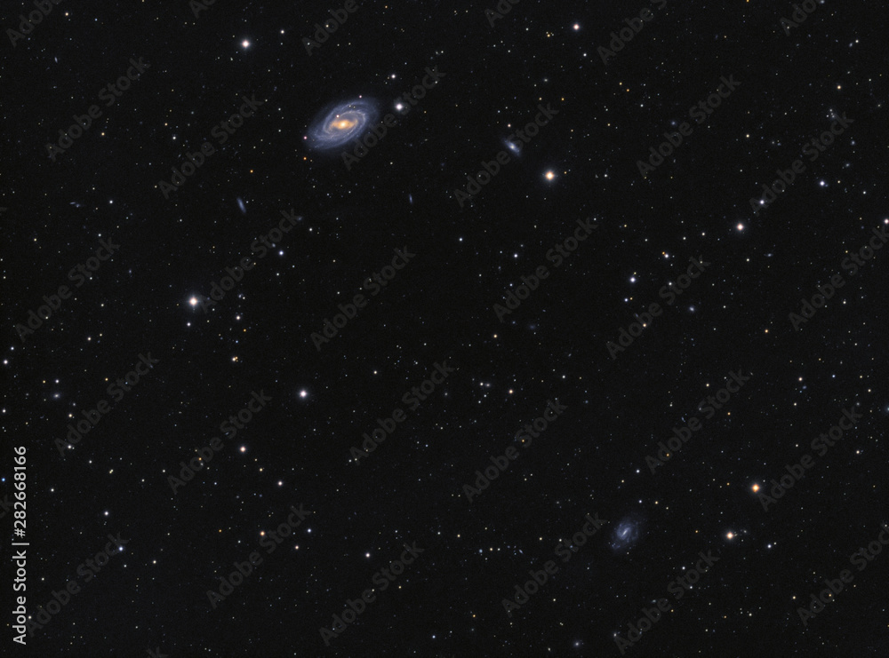 Galaxy M109 (Messier 109) and over 40 small galaxies in the ...