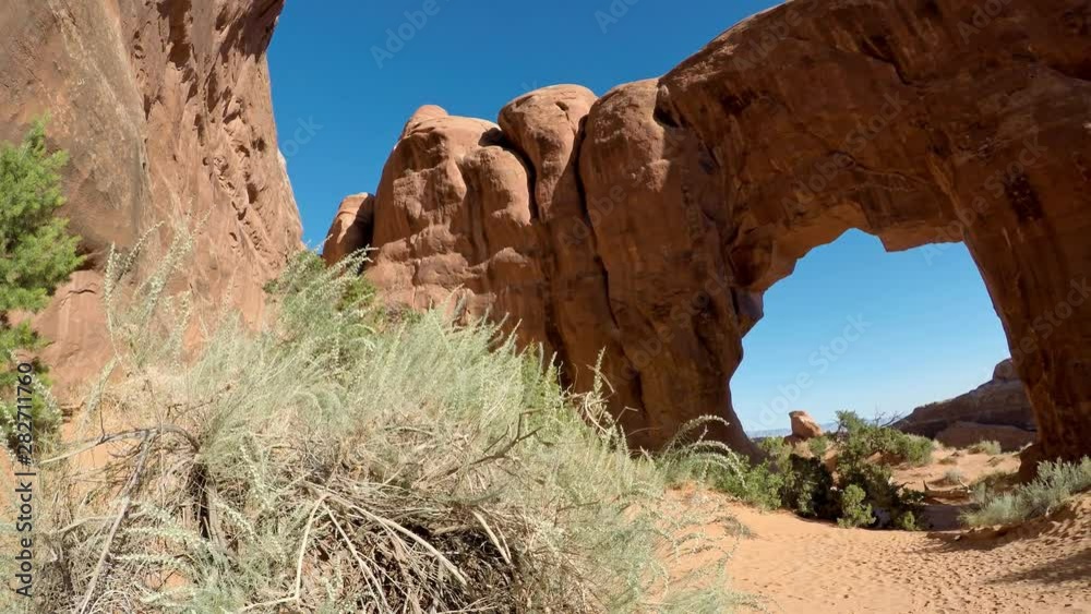 Pine Tree Arch at Arches National Park, utah. Camera panning left to ...
