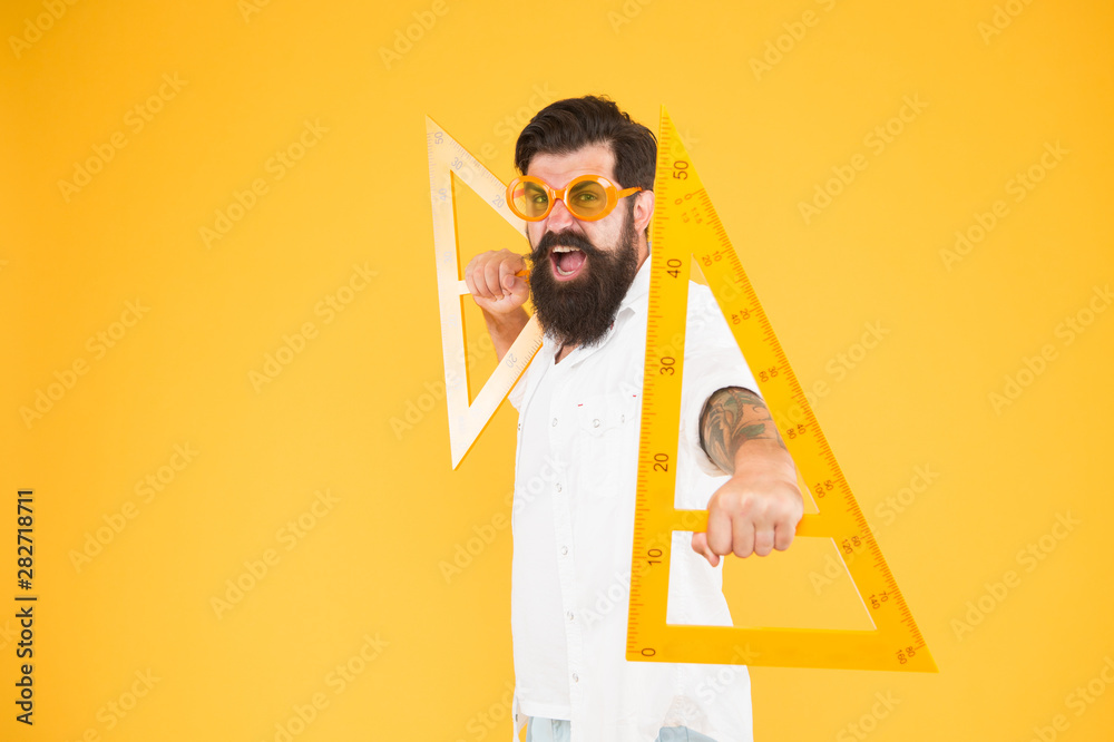 Smart student. Geometry teacher. Student using measuring instrument ...