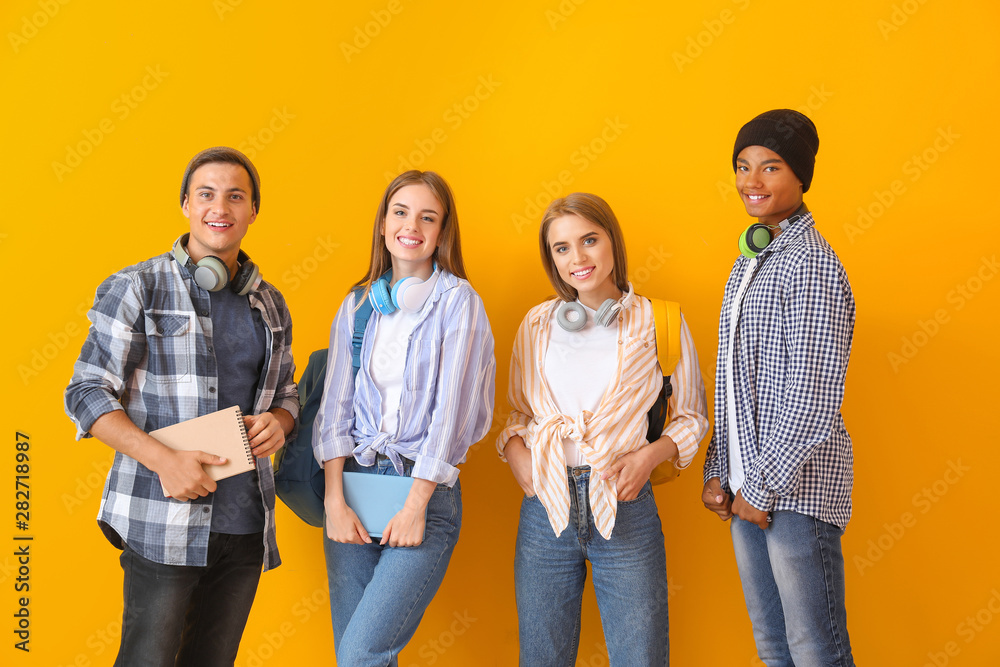 Portrait of young students on color background Stock Photo | Adobe Stock