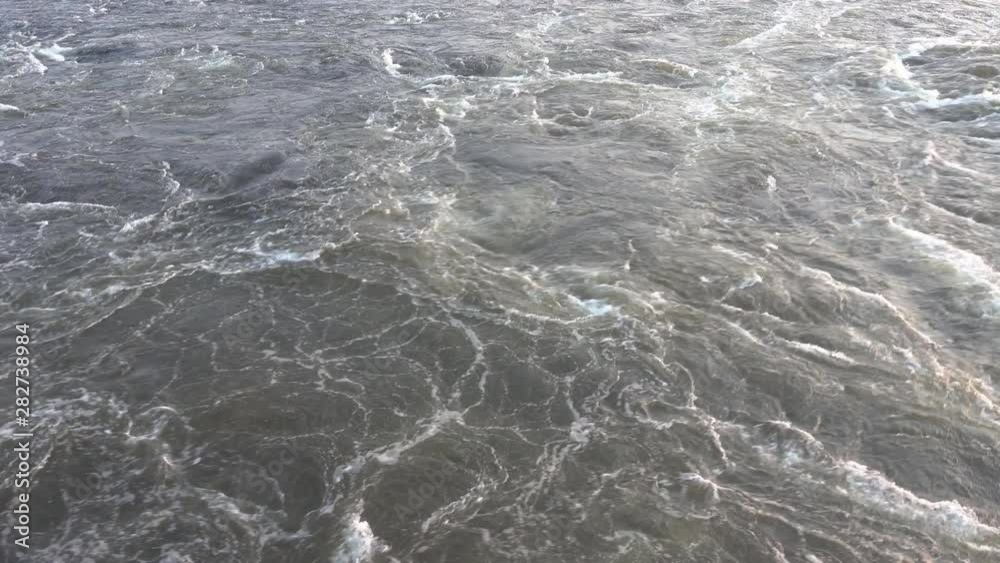 Swelling of the water in the downstream of the power plant resembles a ...