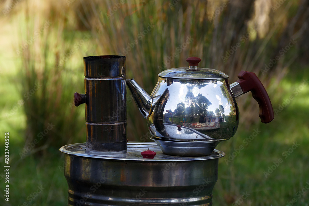 drinking tea, making tea with a samovar, enjoying a turkish samovar tea ...