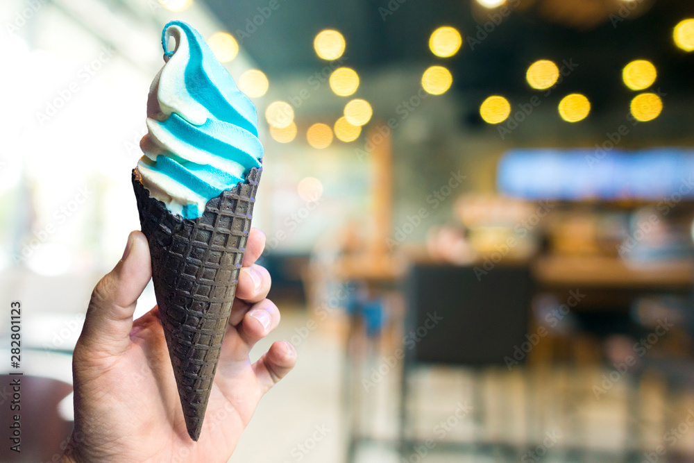 ice cream in cone with blank space Blurred cafe blur background with ...