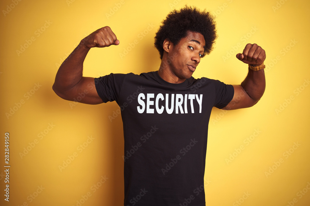 American safeguard man with afro hair wearing security uniform over ...