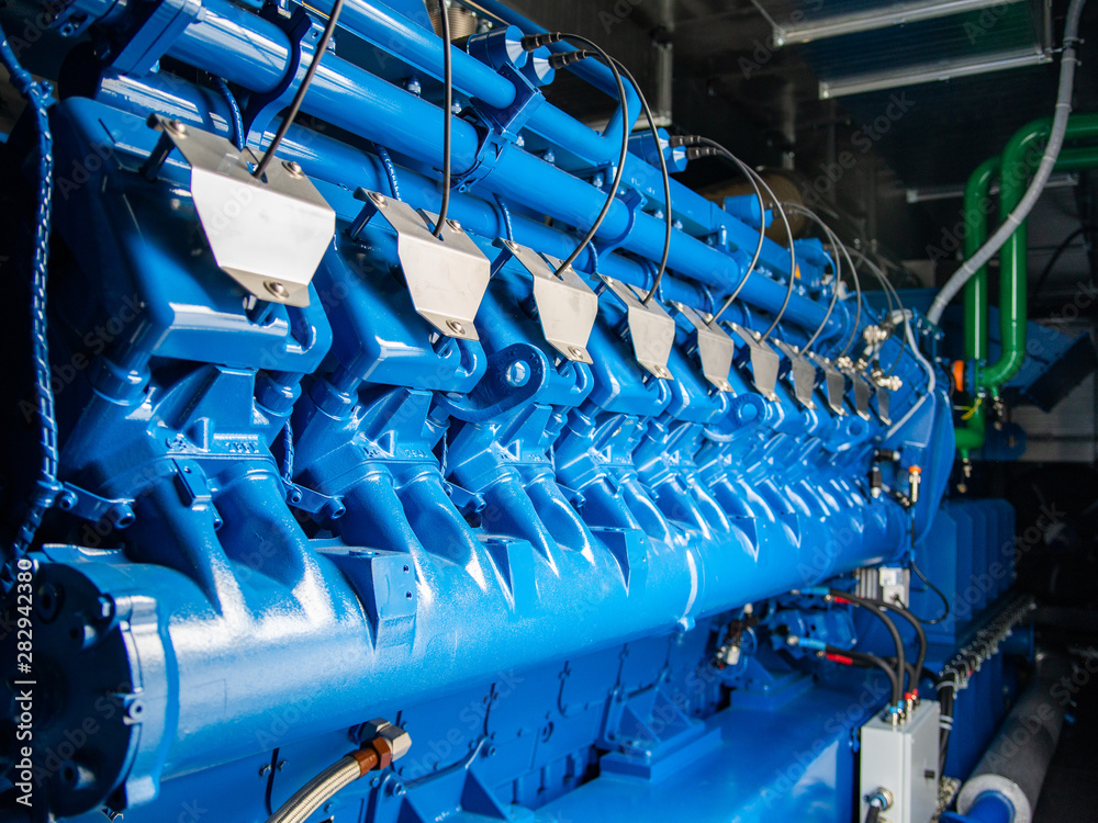 Engine of CHP unit. Diesel and gas industrial electric generator. Stock ...