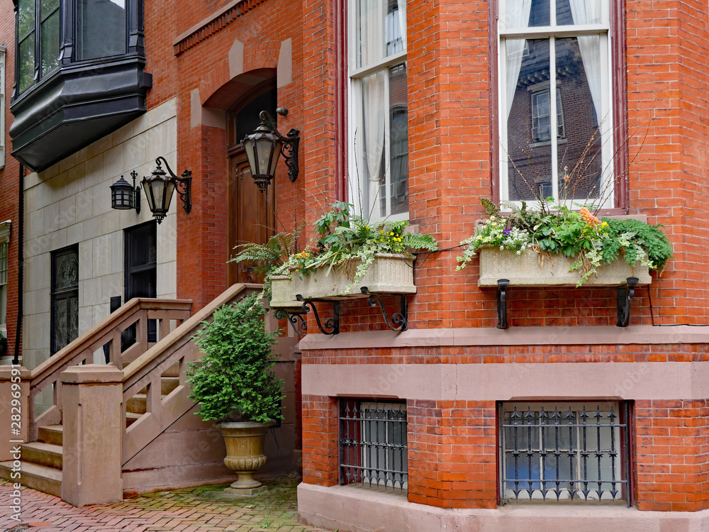 front steps and bay window of old townhouse or apartment building Stock ...