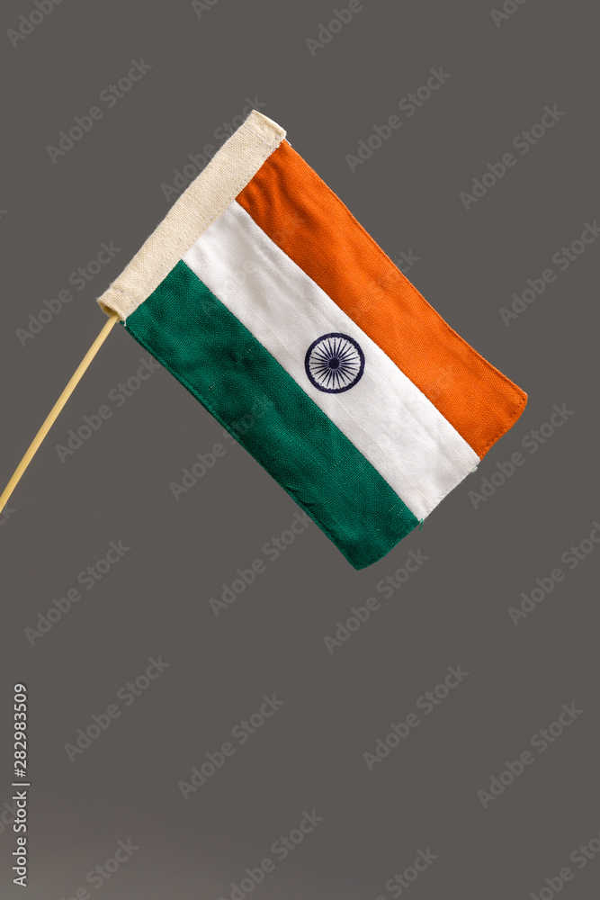 Indian tricolor flag over grey background Stock Photo | Adobe Stock