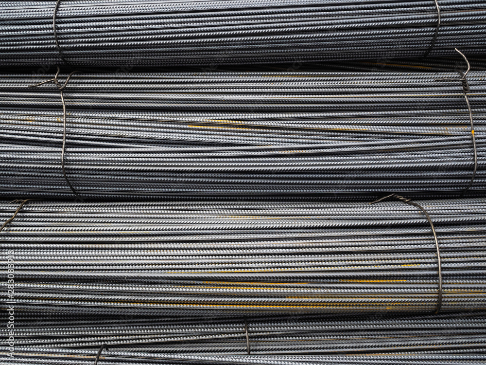 Fotka „Metal construction rods folded in a row. A lot of bars for ...
