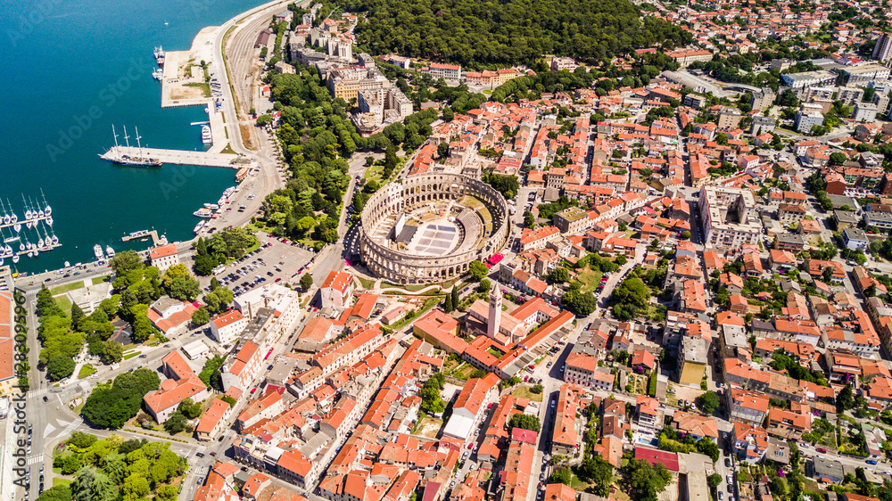 Aerial shoot of Arena ancient Roman amphitheater Old town Pula, Istra ...