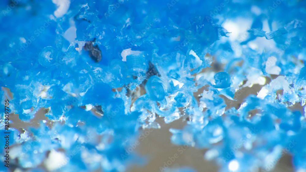 shooting of small and micro plastic pieces in water environment. Stock ...