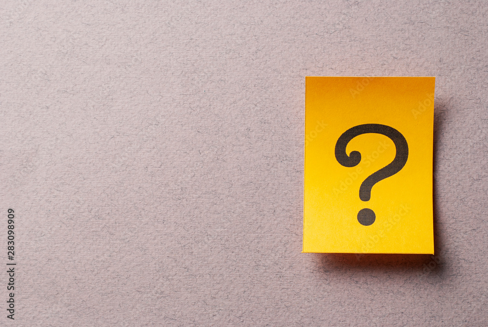 Colorful yellow card with printed question mark Stock Photo | Adobe Stock