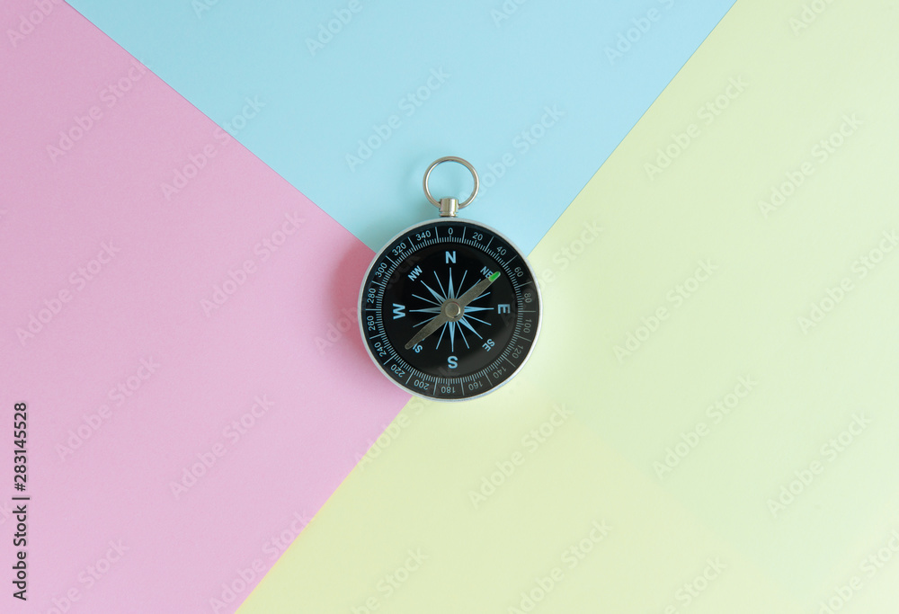 Compass on the colourful background for travel concept Stock Photo ...