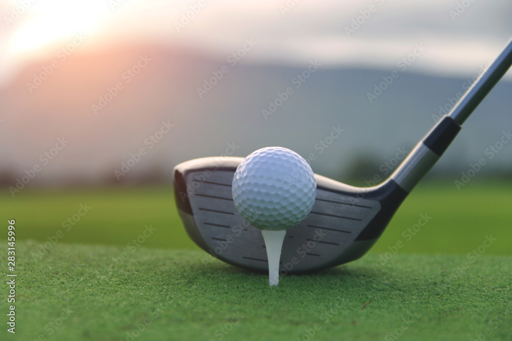 Golf ball and golf club in beautiful golf course at sunset background ...