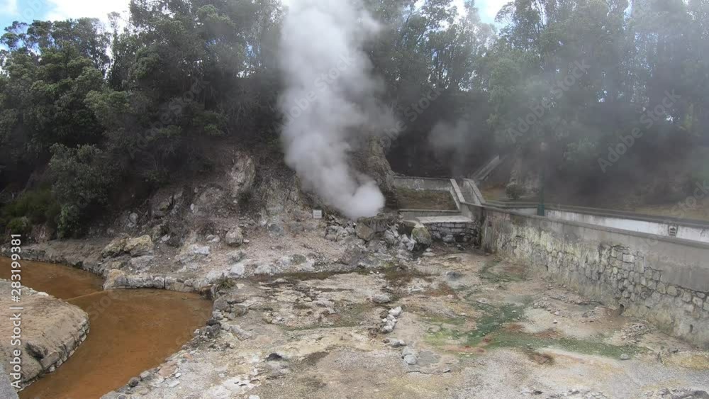 Steam rising from geothermal hot springs in town of Furnas, Sao Miguel ...