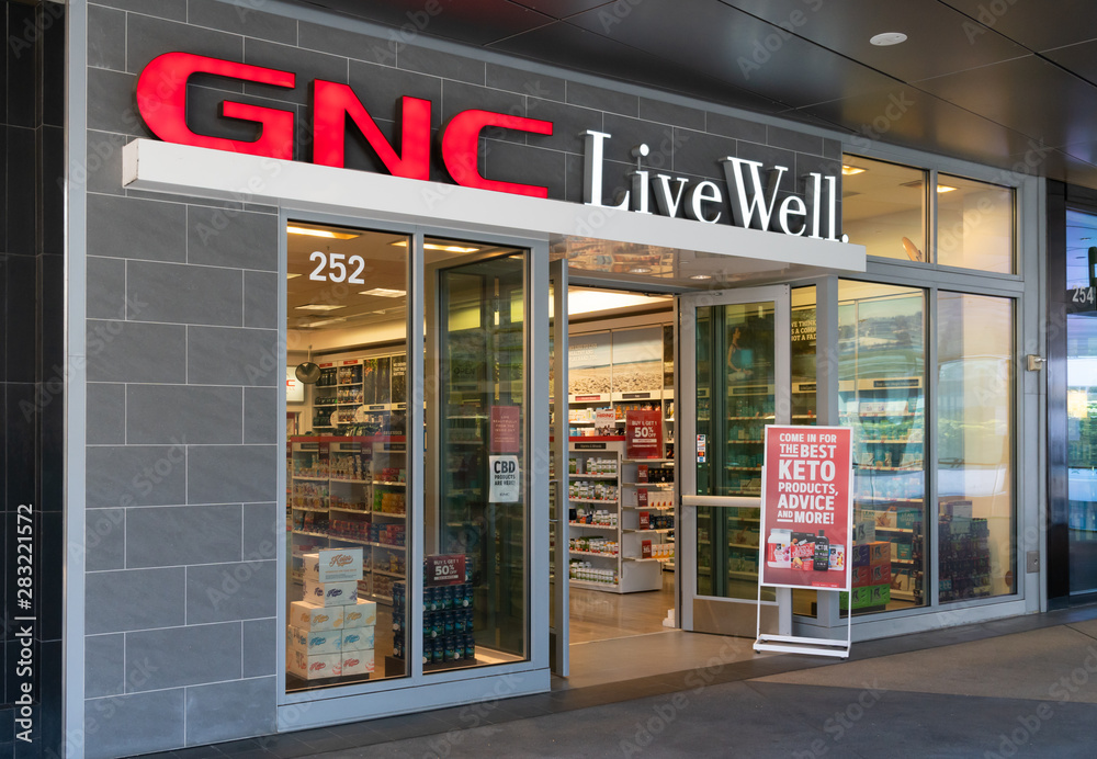 GNC Retail Store Exterior and Trademark Logo Stock Photo | Adobe Stock