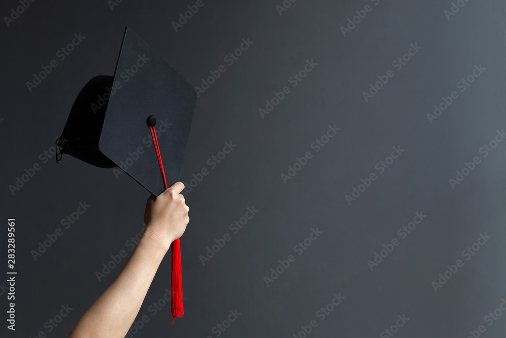 Raising hands with graduation cap on gray board.Celebration Education ...
