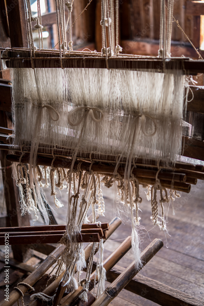 silk fabric weaving loom Stock Photo | Adobe Stock