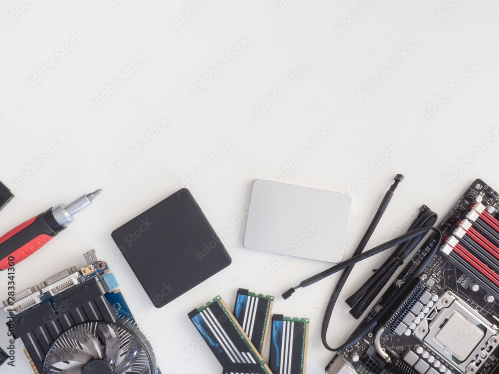 top view of computer parts with harddisk, solid state drive, ram, CPU ...