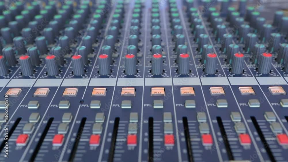 Professional audio mixer with many channels, Musical player for tuning ...