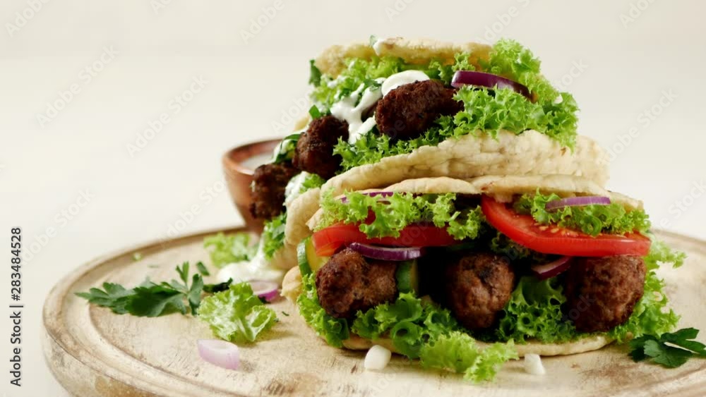 Kebab, kofta in pita, bun. Traditional southern European dish. Front ...