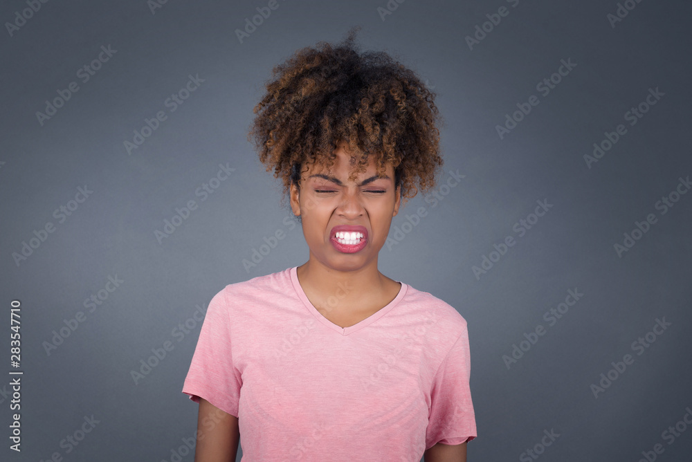 Negative human expressions and attitude. Angry dissatisfied African ...