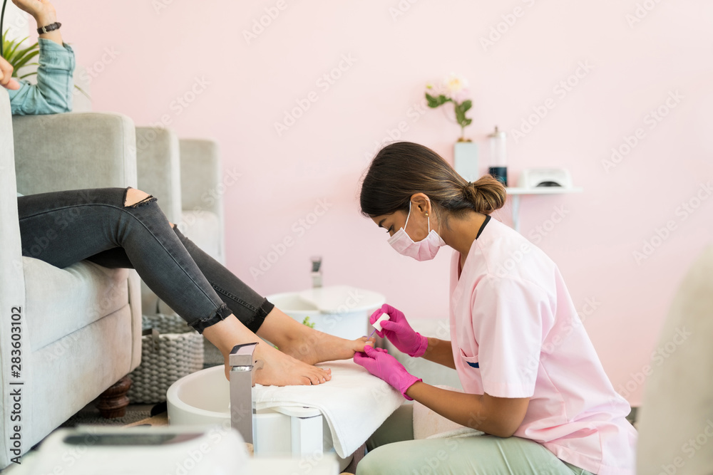 Professional Doing Pedicure Of Customer At Spa Stock Photo | Adobe Stock
