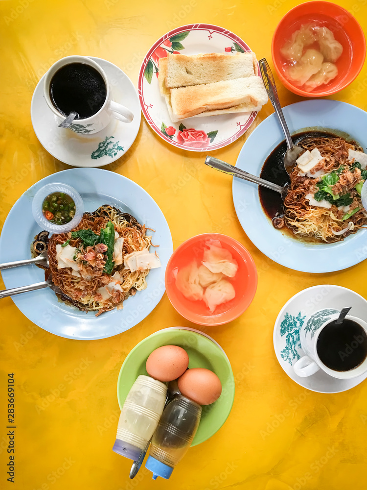 Top view of breakfast meal Malay Mee Kicap Noodle dish with popular ...
