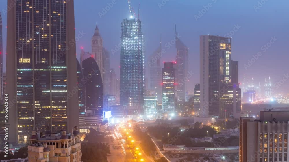 Dubai downtown skyline night to day transition aerial timelapse with ...