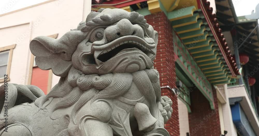 Chinese dragon statue made from stone and concrete in front of a ...