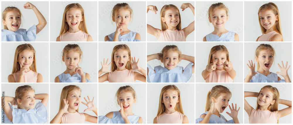 Stylish little girl posing in casual clothes on white studio background ...