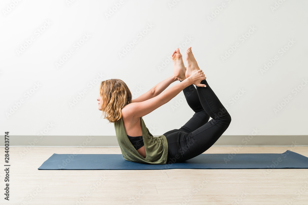 Full Length Of Female Is With Backward Bend Posture Stock Photo | Adobe ...