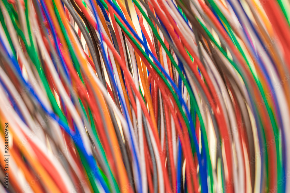 Multi-colored vertical electrical wires. Telecommunication ...