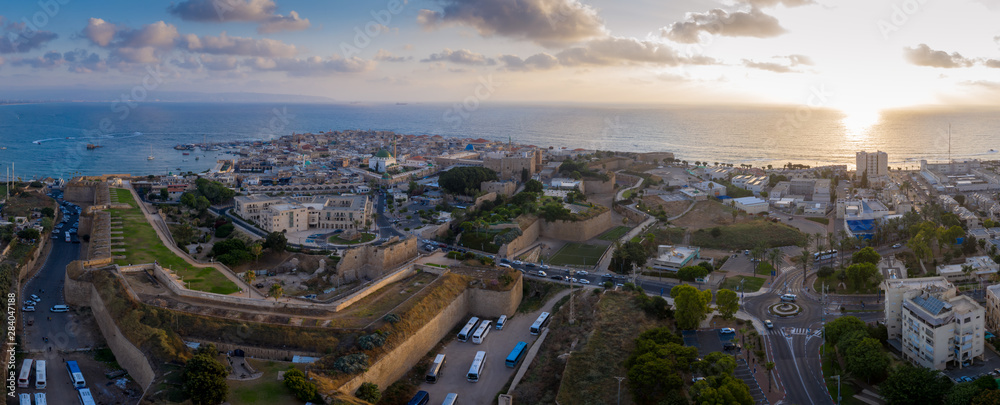 Aerial summer sunset view of Acco, Acre, Akko medieval old city with ...