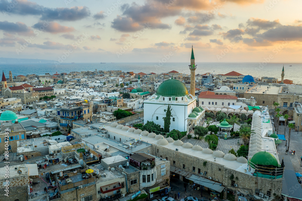 Aerial summer sunset view of Acco, Acre, Akko medieval old city with ...