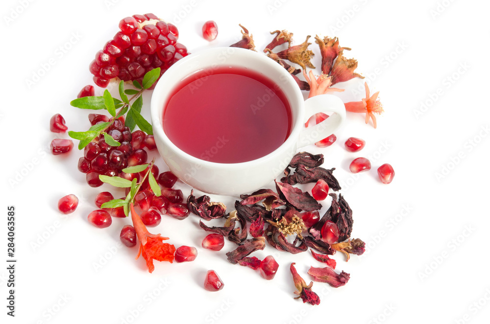 Parts of a pomegranate with pomegranate seeds and leaves, flowers, dry ...