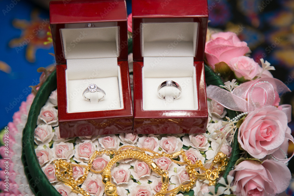 Wedding rings in wedding ceremony,Thai wedding rings in an open box on ...