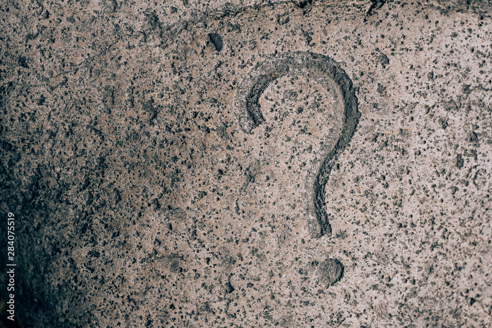 Question mark carved on a stone. Punctuation mark on granite. Stone ...